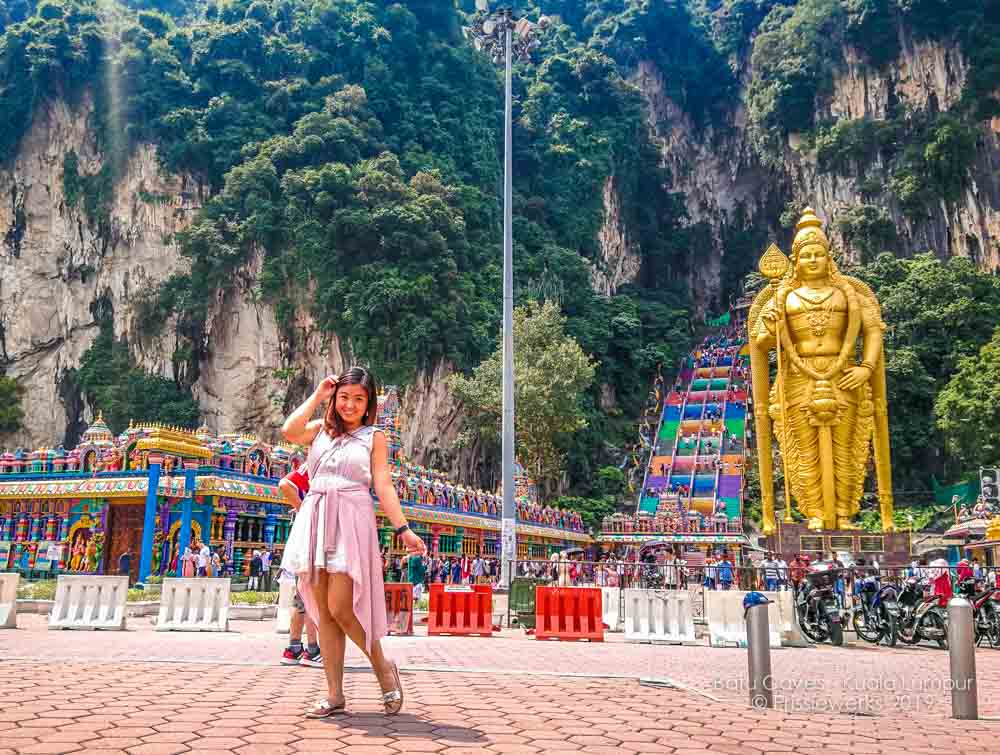 Scaling up the colorful stairs at Batu Caves - Prissiewerks